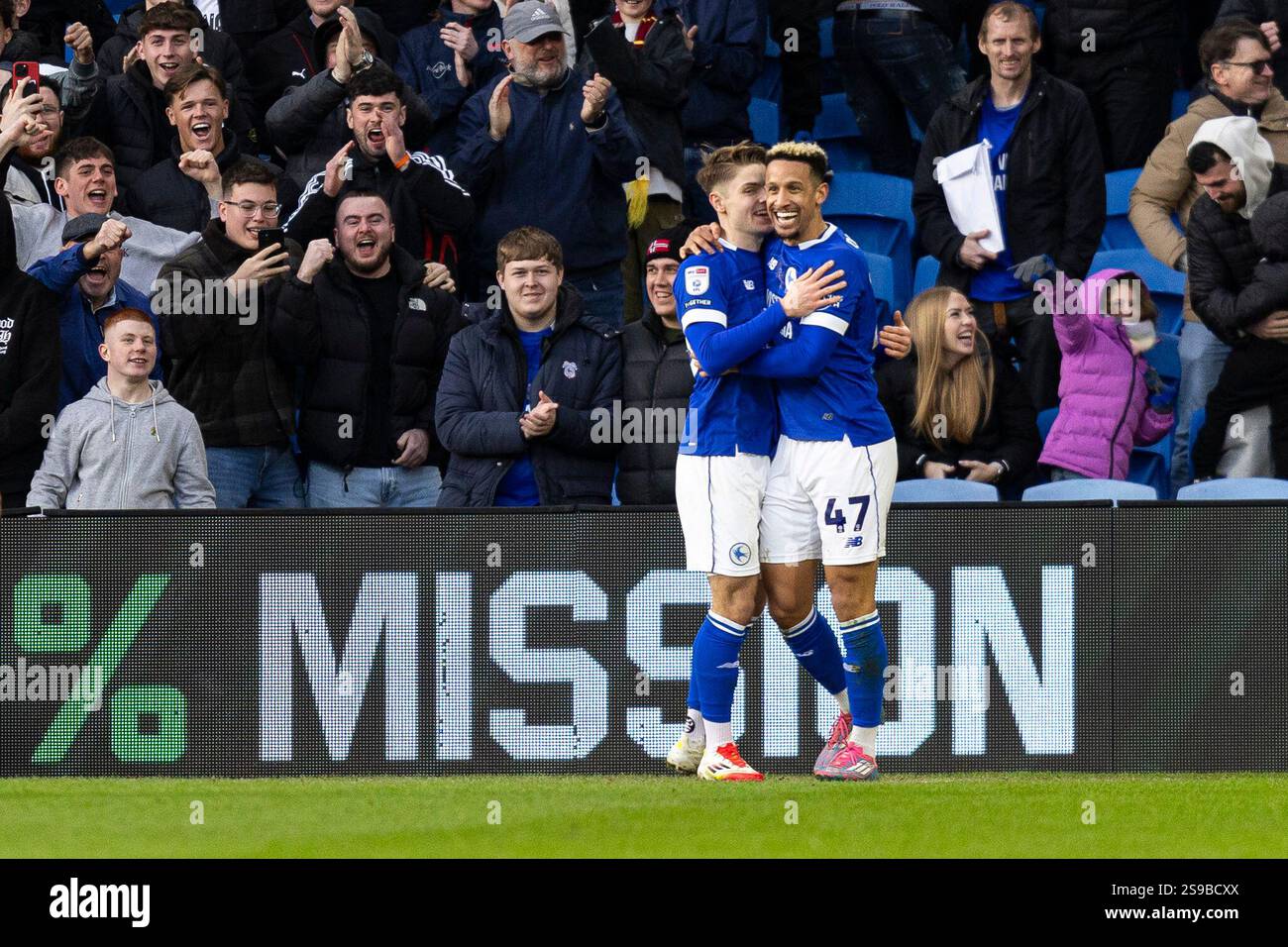 Callum Robinson of Cardiff City (R) celebrates scoring his sides first ...