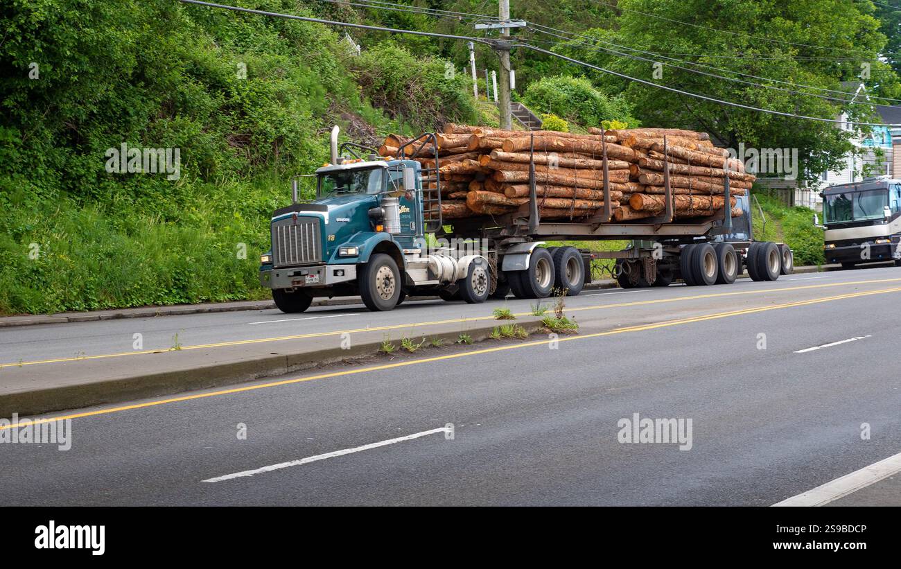 Astoria, Oregon, USA - May 21, 2019: Kenworth Tridem. Deforestation and ...