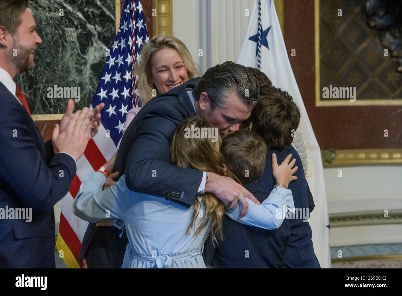 Pete Hegseth hugs his children after being sworn in as Secretary of ...