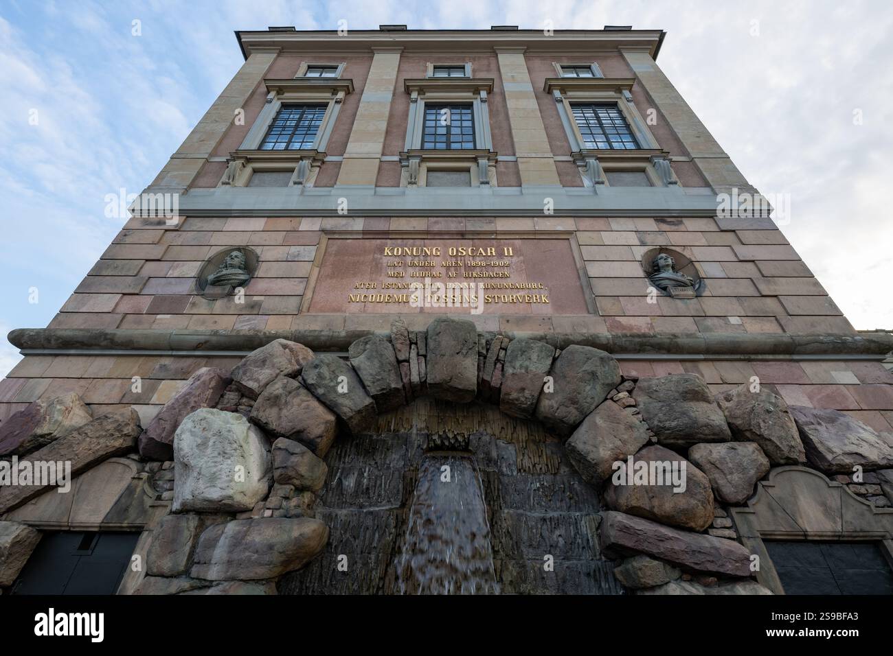 Stockholm, Sweden - Aug 3, 2024: The waterfall with plaque honoring King Oscar II in Stockholm ...