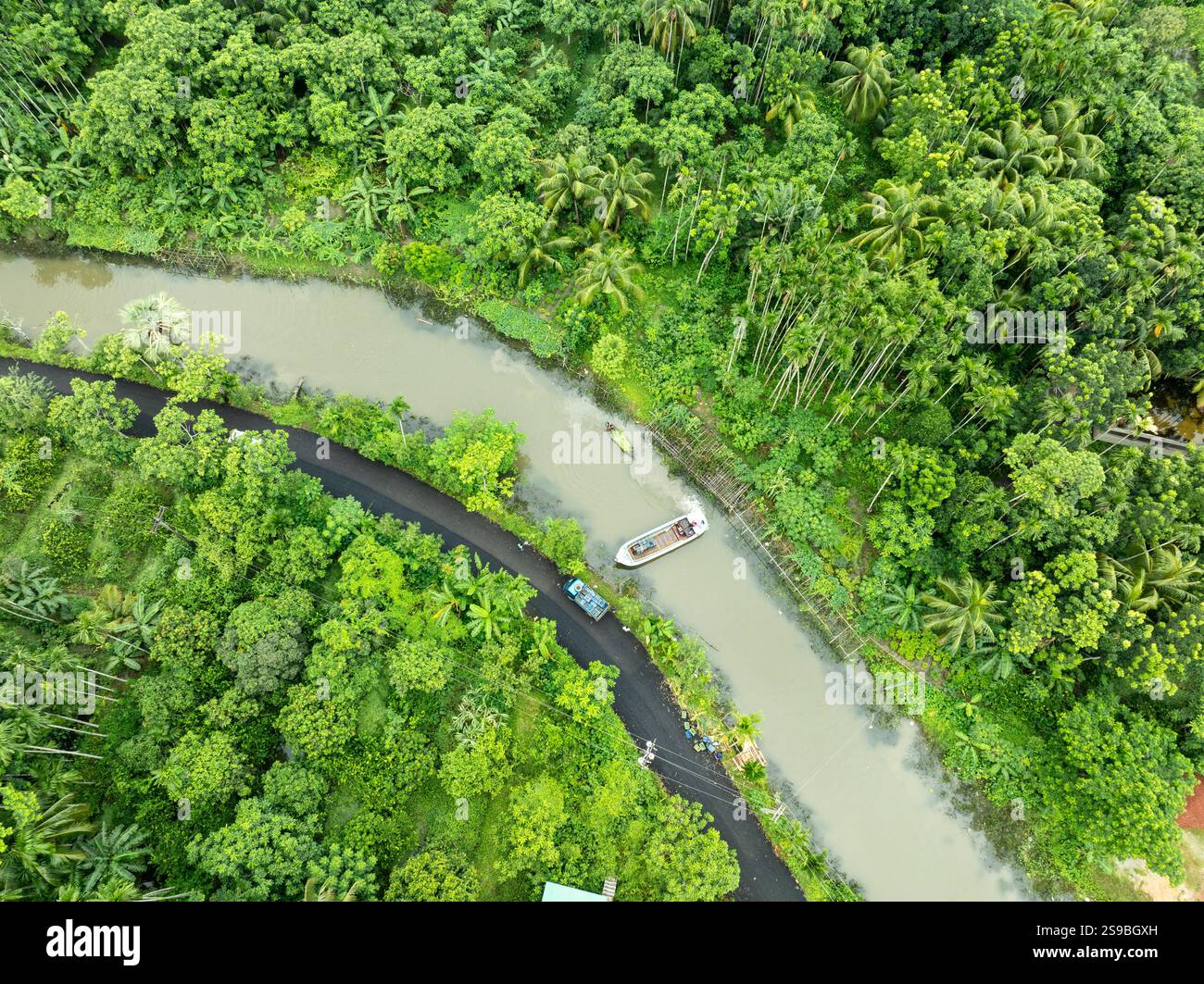 Aerial view of a boat sailing at floating guava garden with beautiful ...
