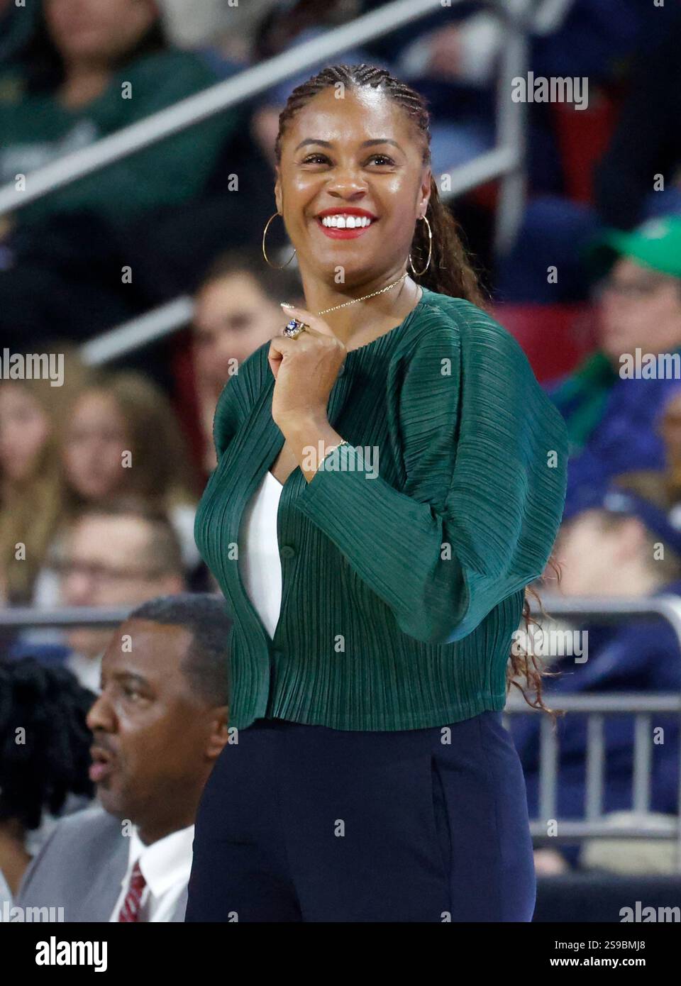 Notre Dame head coach Niele Ivey smiles from the bench during the ...