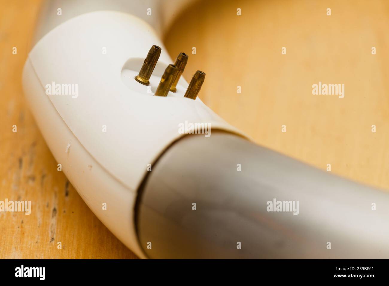 Circular fluorescent tube burned out and blackened at the cathodes ...