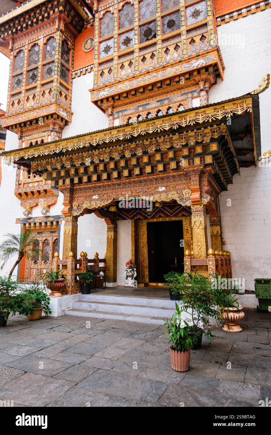Classic Bhutanese architecture of whitewashed walls and brightly ...