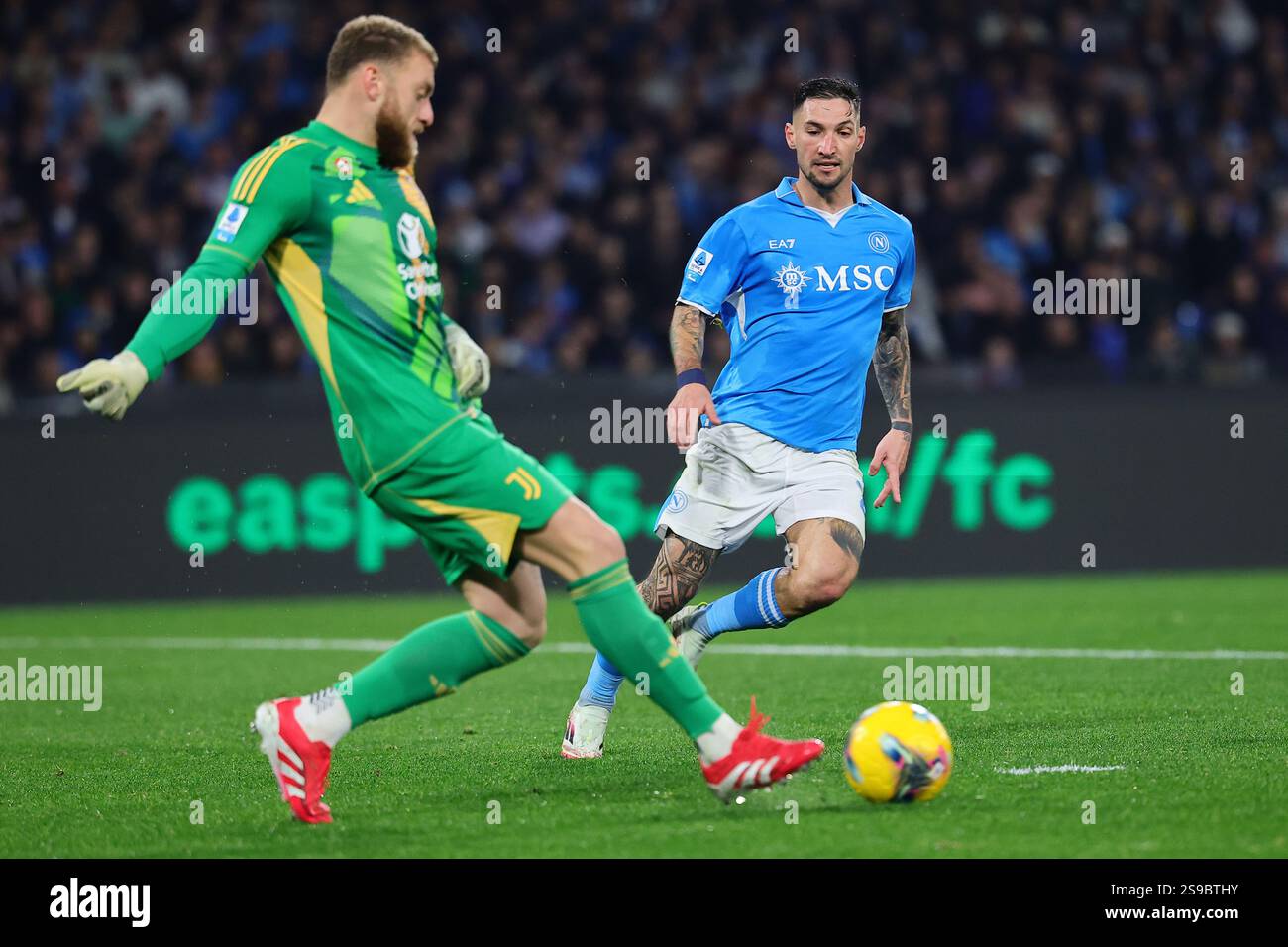 Michele Di Gregorio of Juventus FC and Matteo Politano of SSC Napoli ...