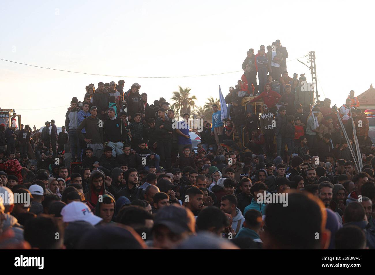 Hundreds of Palestinians gather on Al-Rashid Street, west of the ...