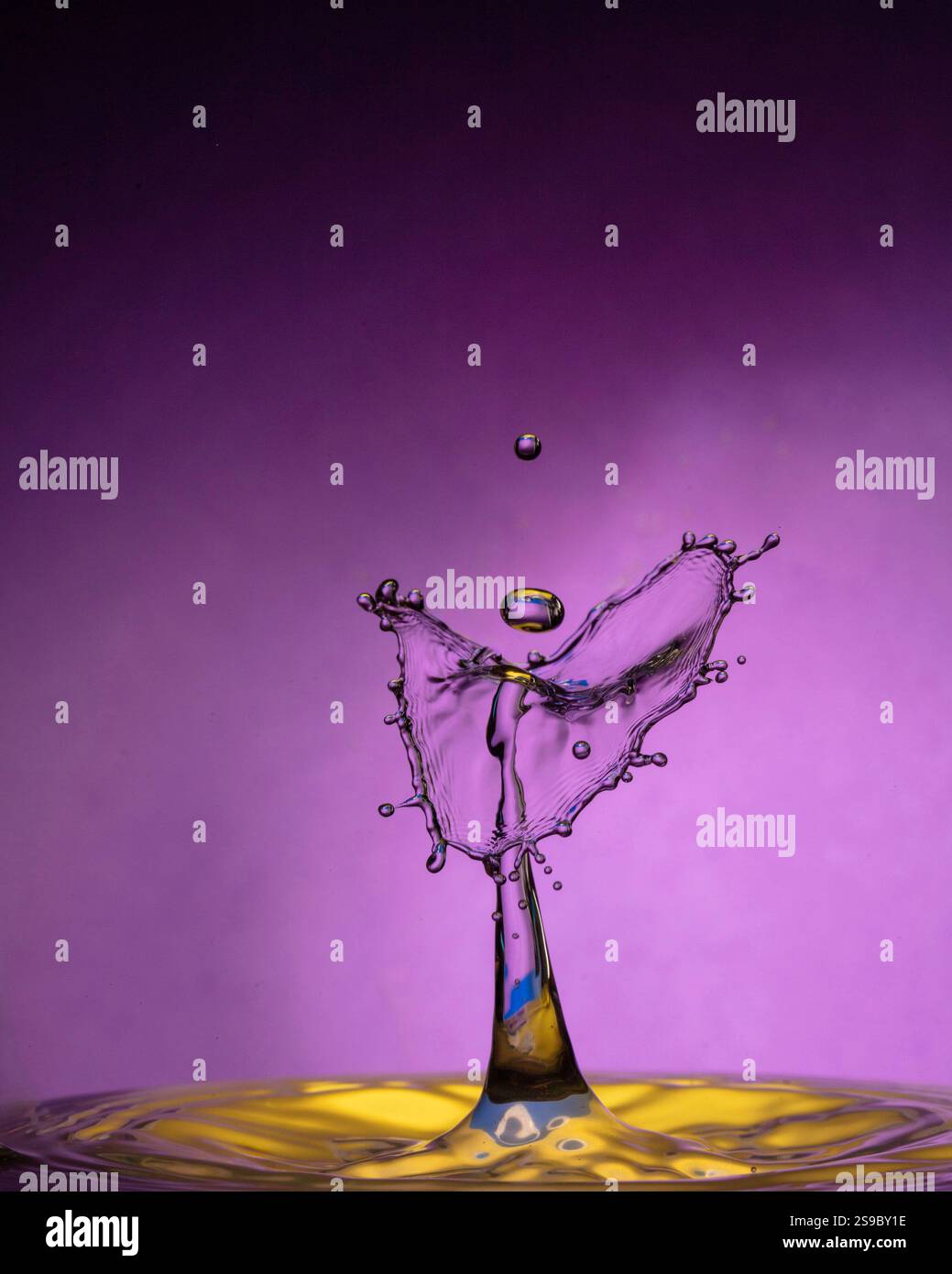 Arresting, ethereal, colour infused, imaginative water collision, macro ...