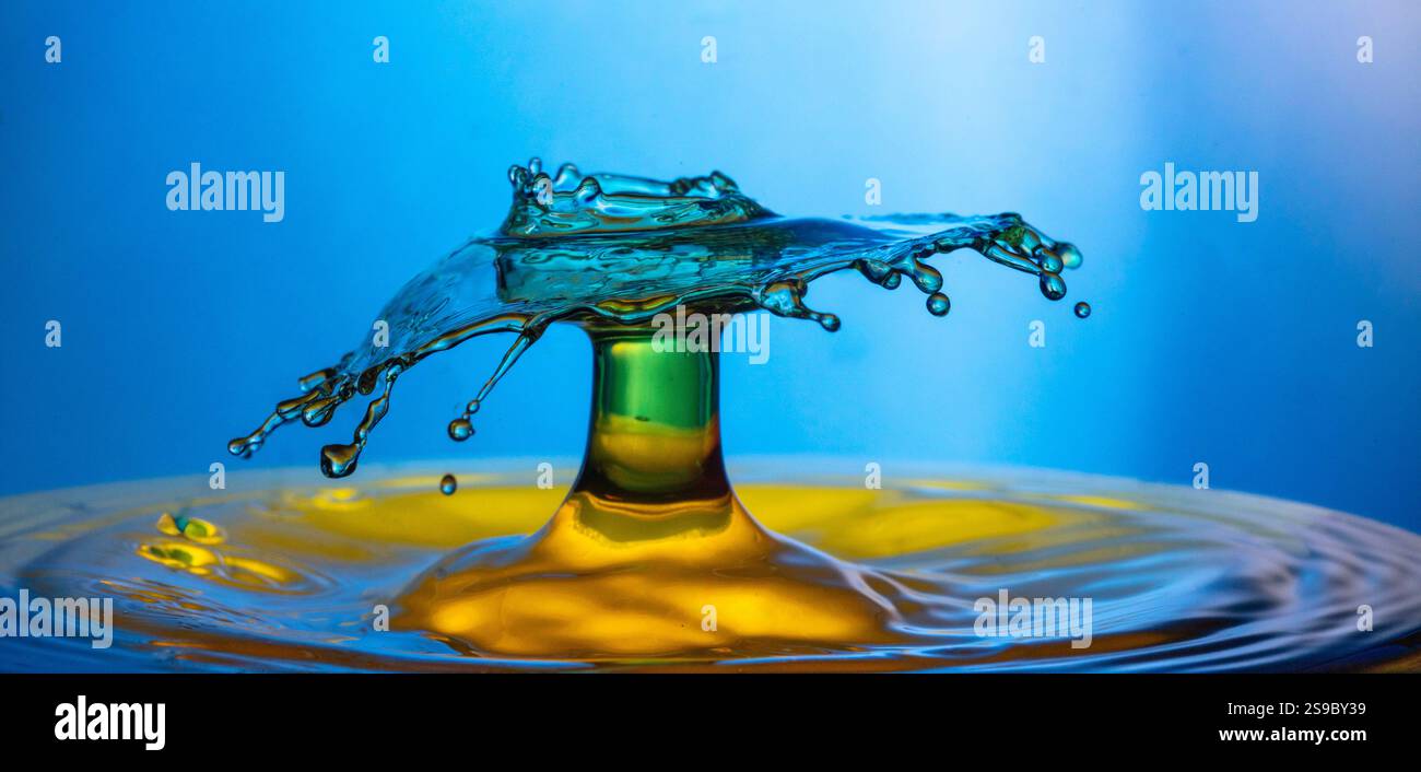 Arresting, ethereal, colour infused, imaginative water collision, macro ...