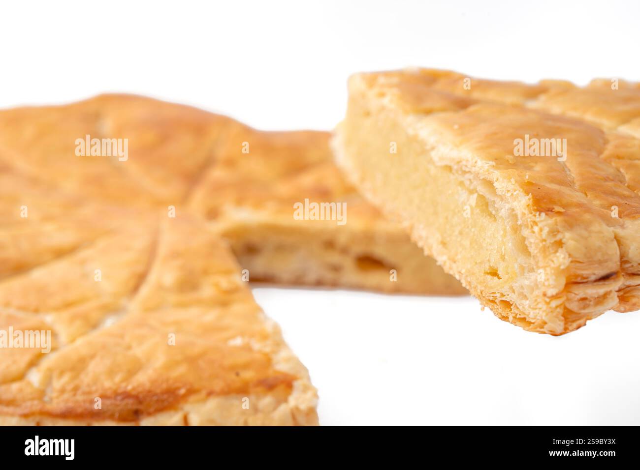 Paris, France - 01 24 2025: A homemade frangipani king cake with a ...