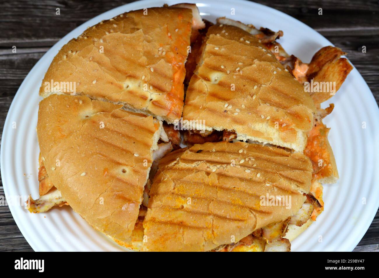 four quarters of a Syrian Maria shawarma chicken pie, Chicken Shawarma ...