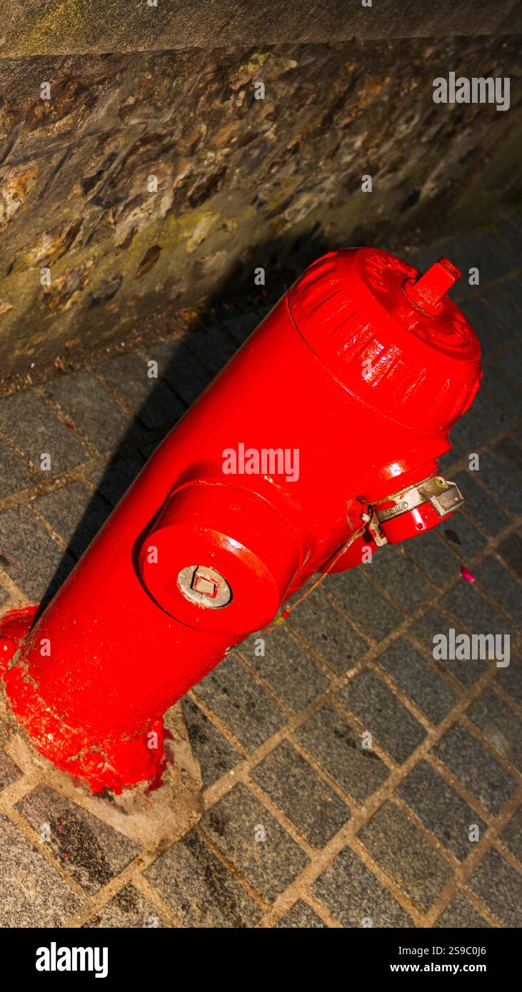 Front view, medium distance of a red fire water hydrant Stock Photo - Alamy