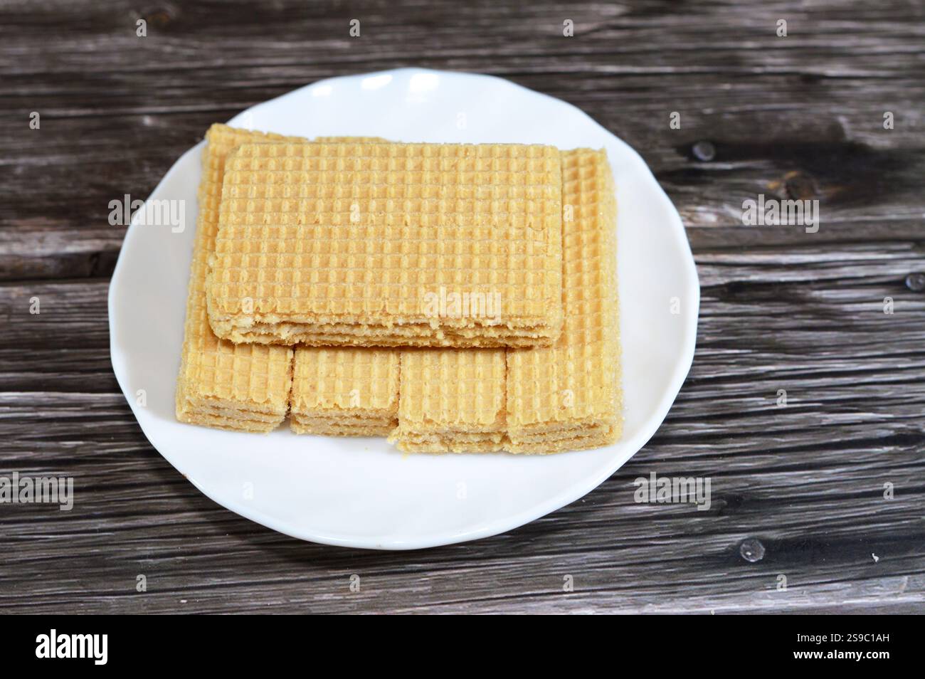layers of wafer biscuits filled with creamy vanilla, a wafer is a crisp ...