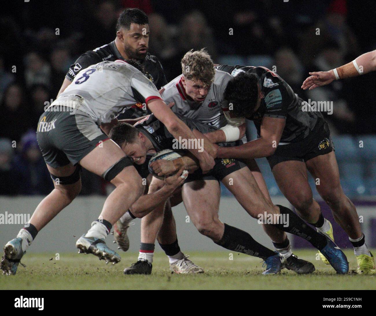 Exeter Chiefs' Tom Wyatt (centre) is tackled during the Gallagher ...