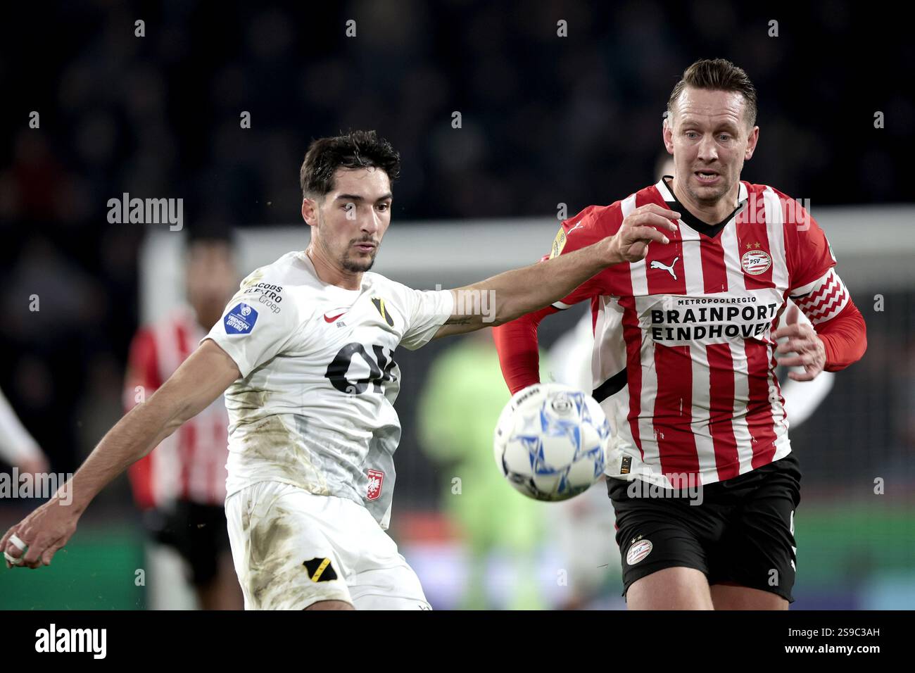 EINDHOVEN - (l-r) Leo Greiml of NAC Breda, Luuk de Jong of PSV ...