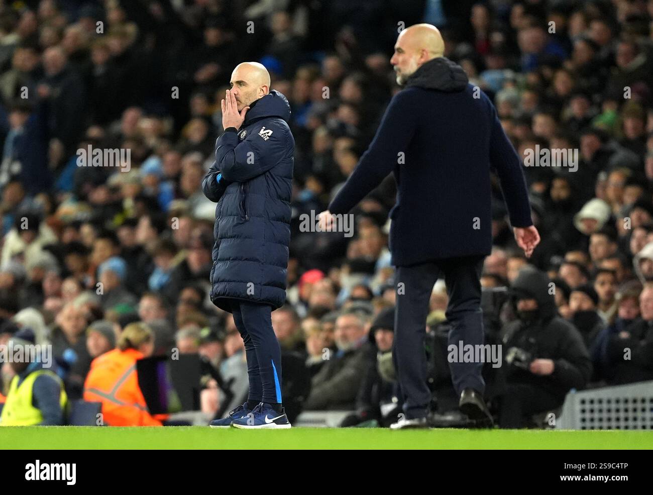 Chelsea manager Enzo Maresca (left) and Manchester City manager Pep ...