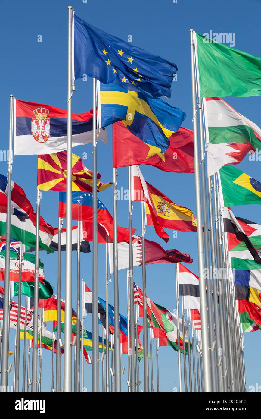 Many world's countries national flags waving on the wind, with European ...