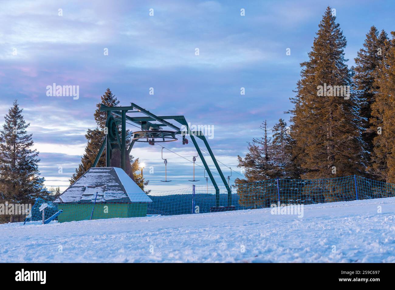 Ski lift on Rogla, ski resort on pohorje on colorful winter evening ...