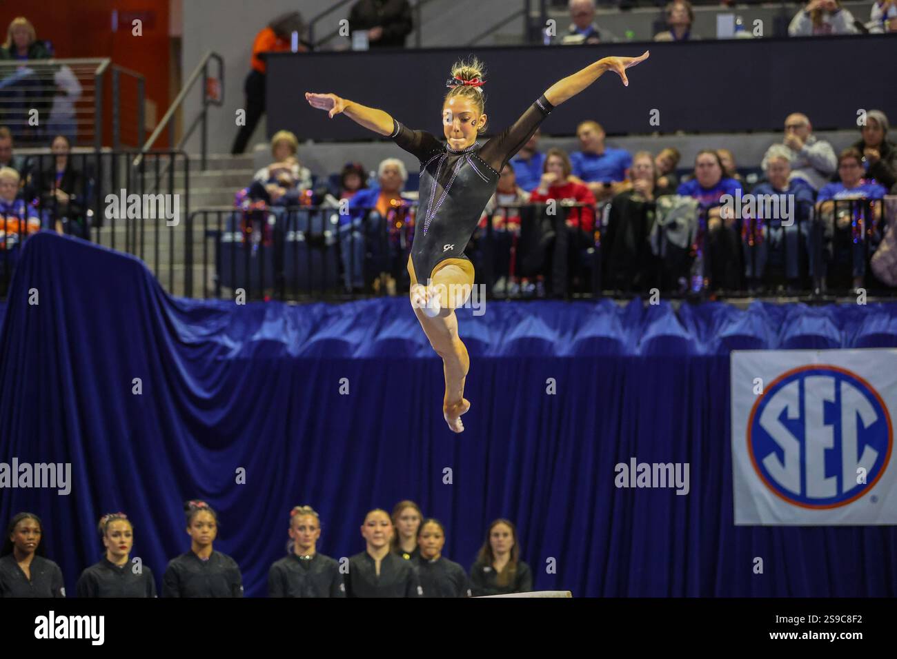 Georgia's Lily Smith competes on the beam during an NCAA gymnastics ...