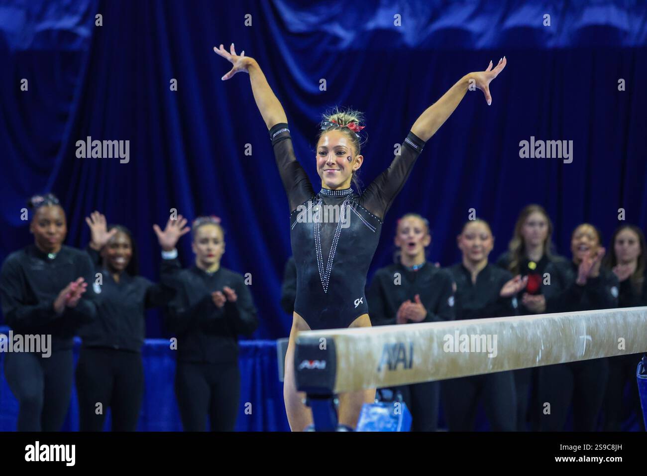 Georgia's Lily Smith competes on the beam during an NCAA gymnastics ...