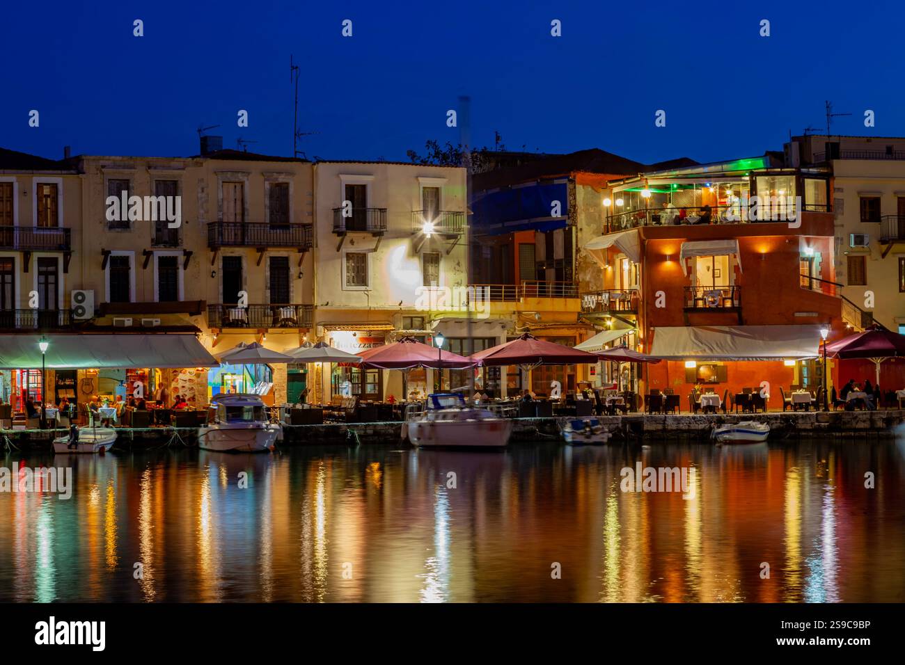 Panoramic view of the the Old Venetian Harbour at night, Rethymnon ...