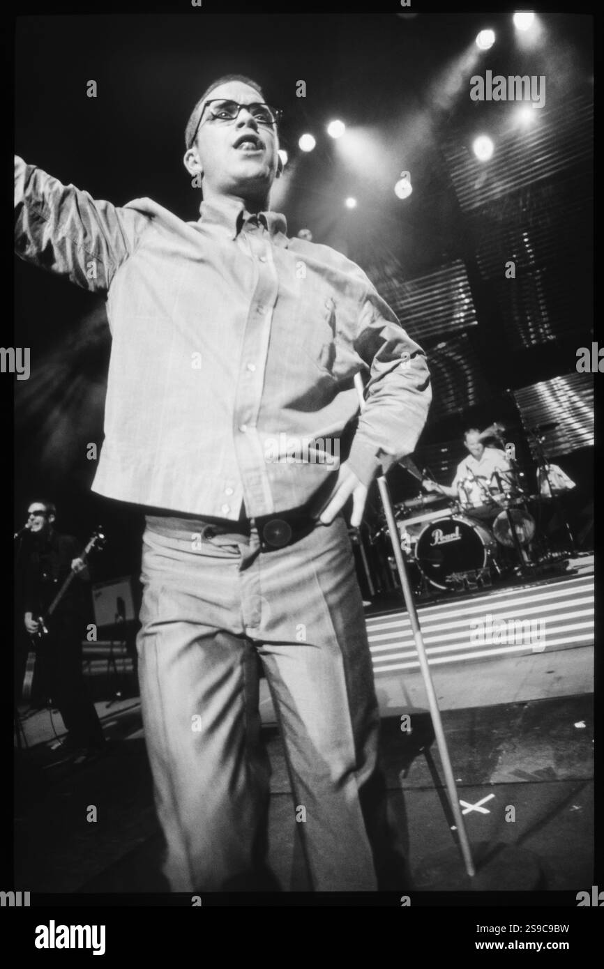 ROBBIE WILLIAMS, SINGER, FIRST TOUR, 1997: Robbie Williams playing live ...