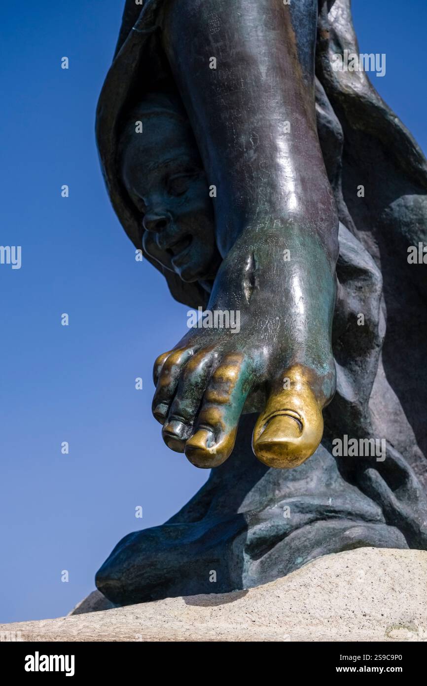 Golden polished toe of the Statue of the Redeemer of Nuoro, Statua del ... Golden polished toe of the Statue of the Redeemer of Nuoro, Statua del ...