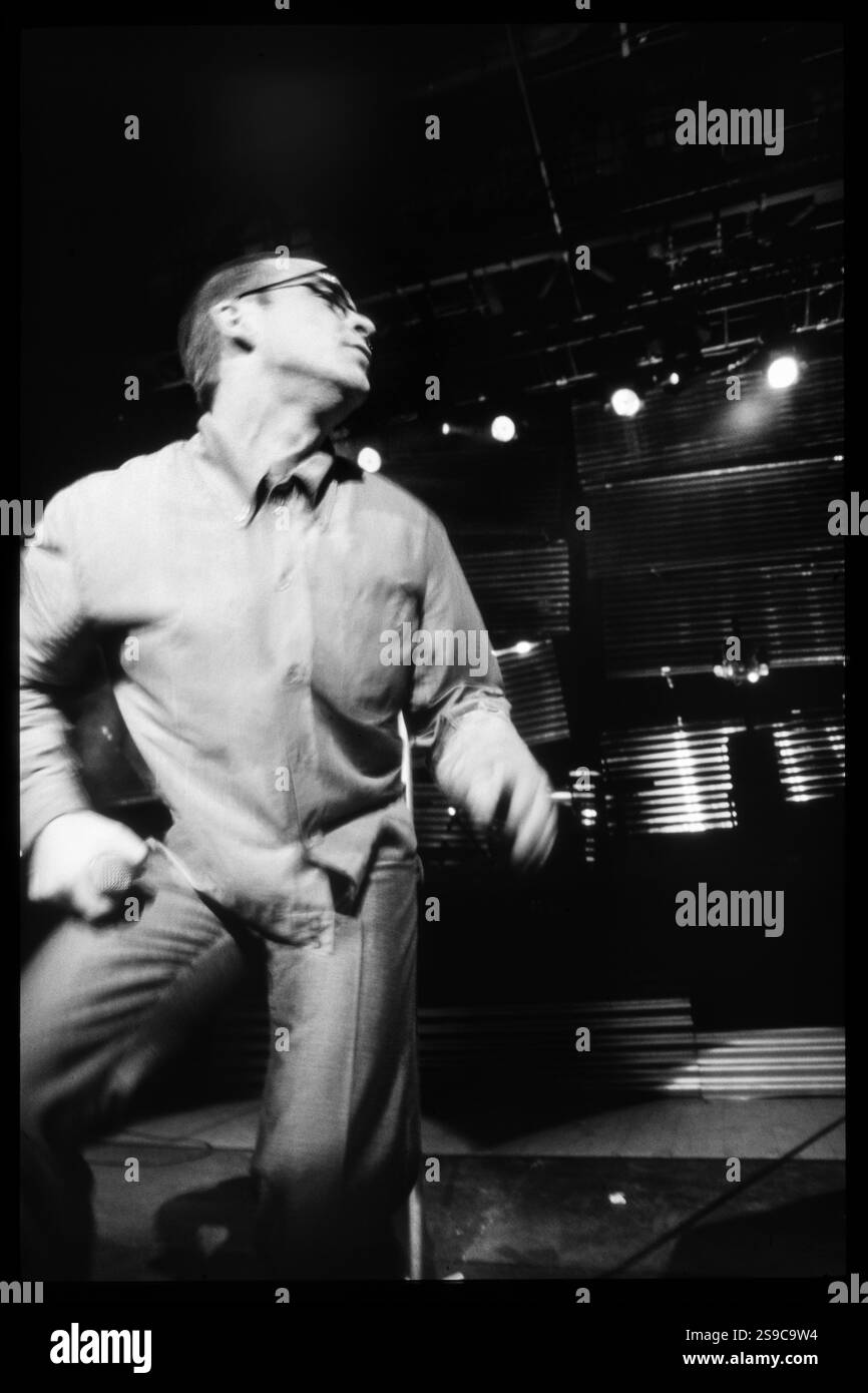 ROBBIE WILLIAMS, SINGER, FIRST TOUR, 1997: Robbie Williams playing live ...