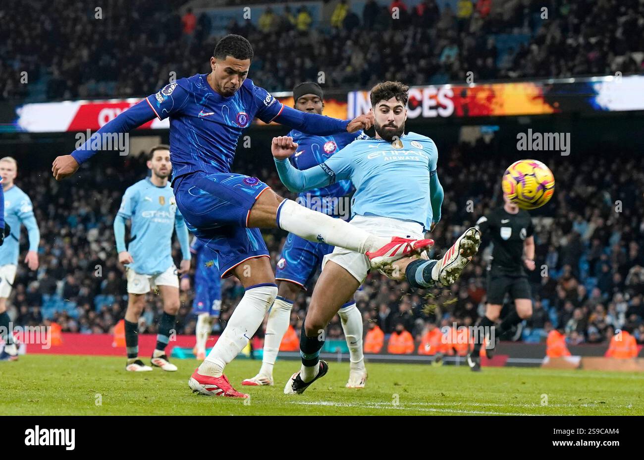 Manchester, England, 25th January 2025. Levi Colwill of Chelsea (L ...