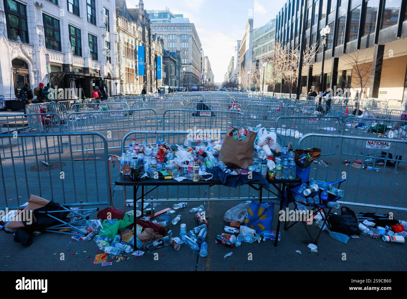 Trash left at a security checkpoint stretches for blocks outside ...