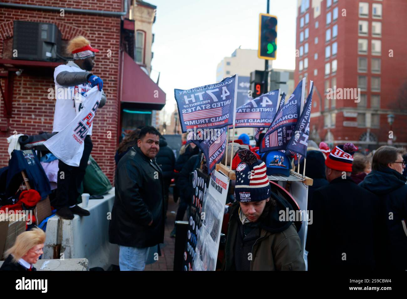 Vendors sell Donald Trump merchandise on Inauguration Day. Trump was ...