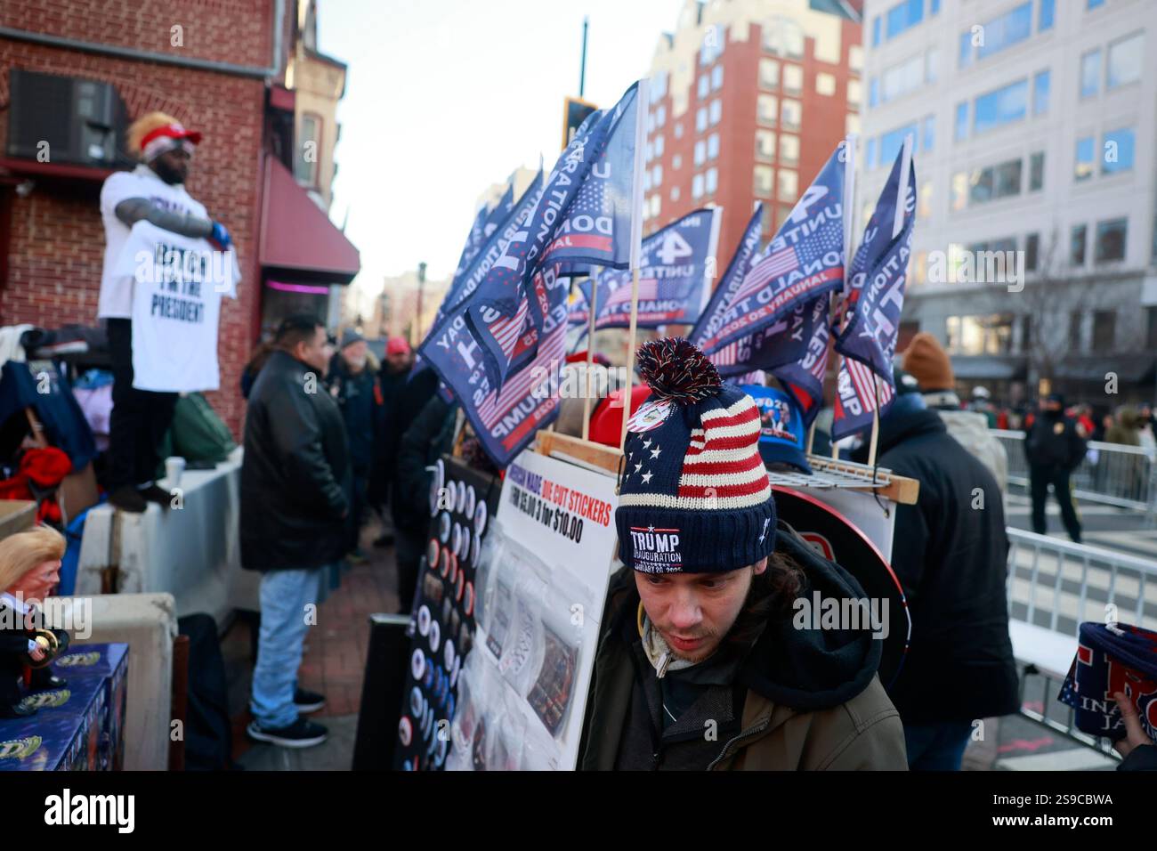 Vendors sell Donald Trump merchandise on Inauguration Day. Trump was ...