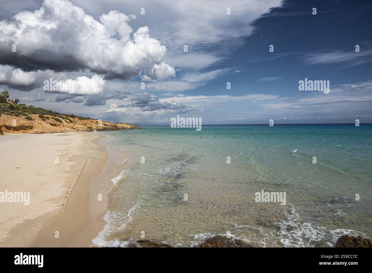 The beautiful beach of Pinus in Sardinia with fine sand and blue and ...
