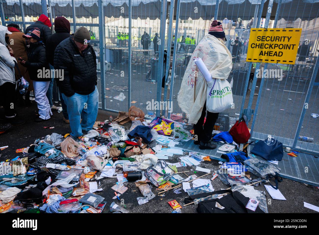 Piles of trash are left at a security checkpoint outside Capital One ...