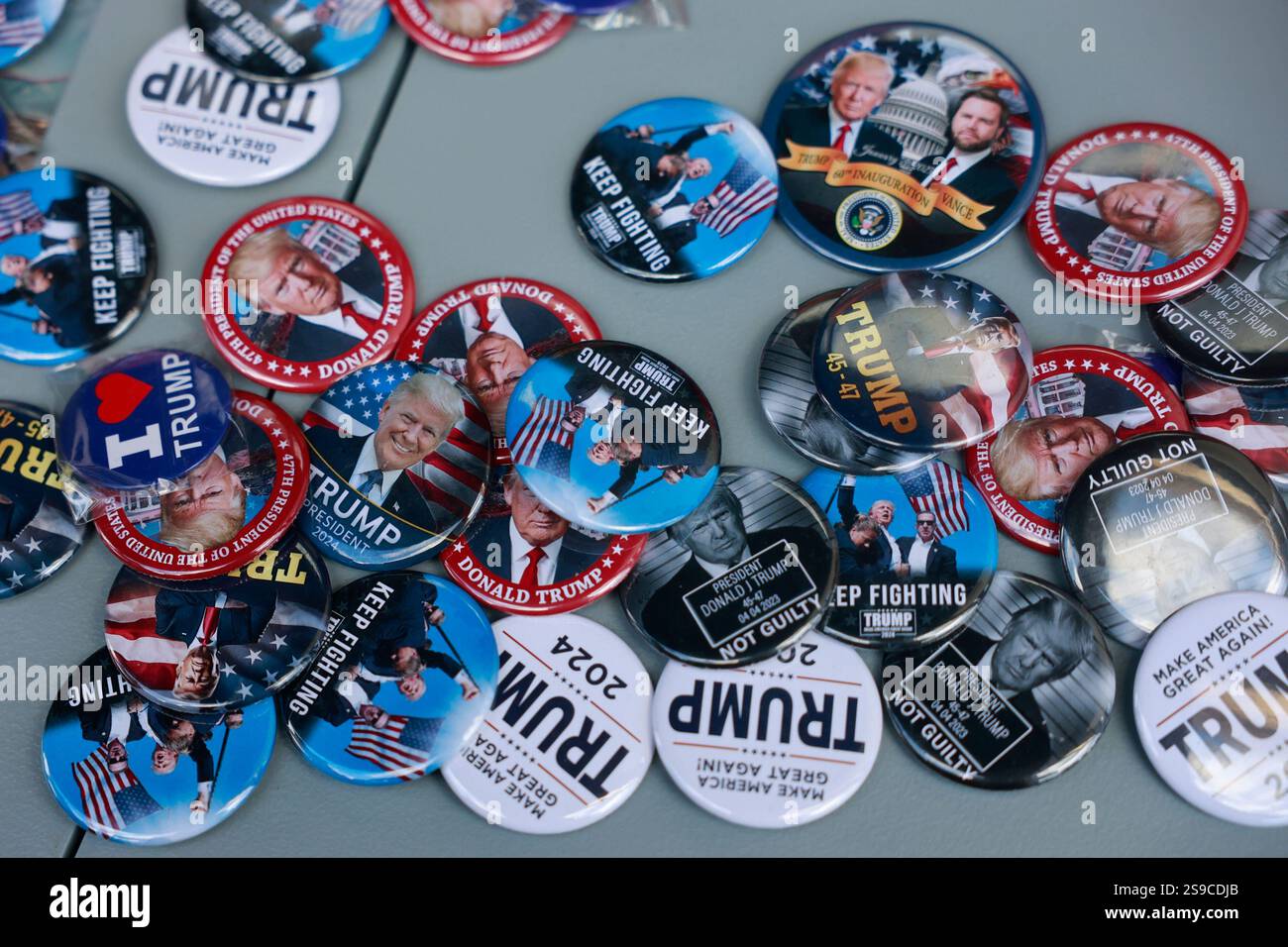 Vendors sell Donald Trump pins on Inauguration Day. Trump was sworn in ...