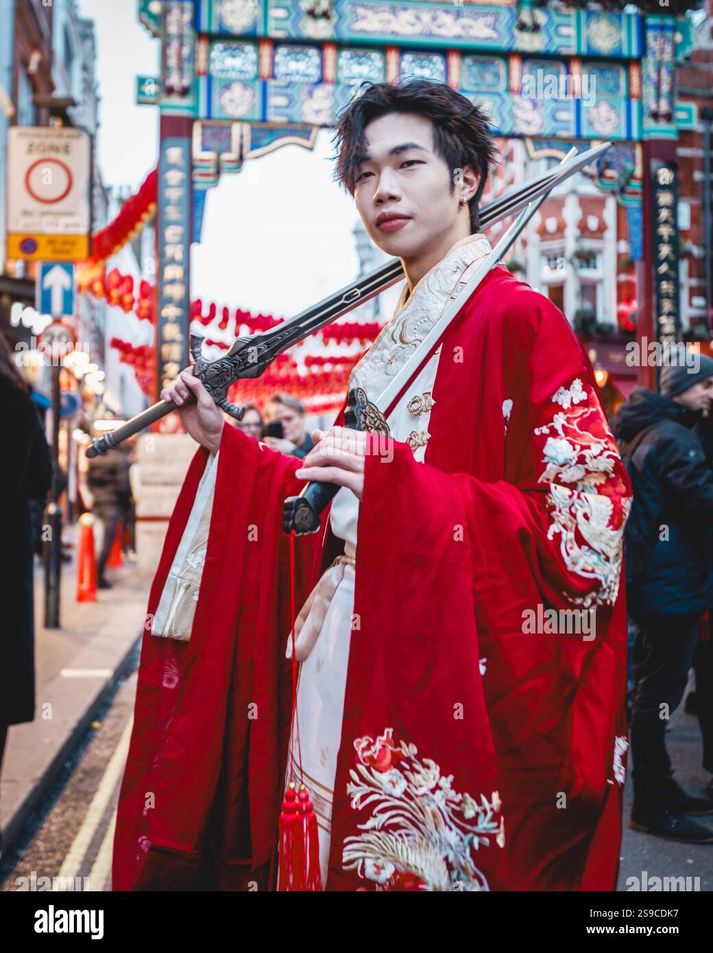 A portrait of a Chinese man in a traditional hanfu with two dao (swords ...
