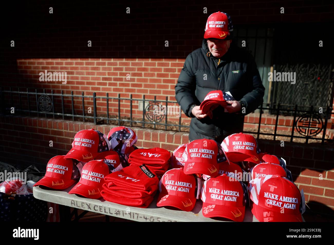 A man sells Donald Trump MAGA hats and other merchandise on ...