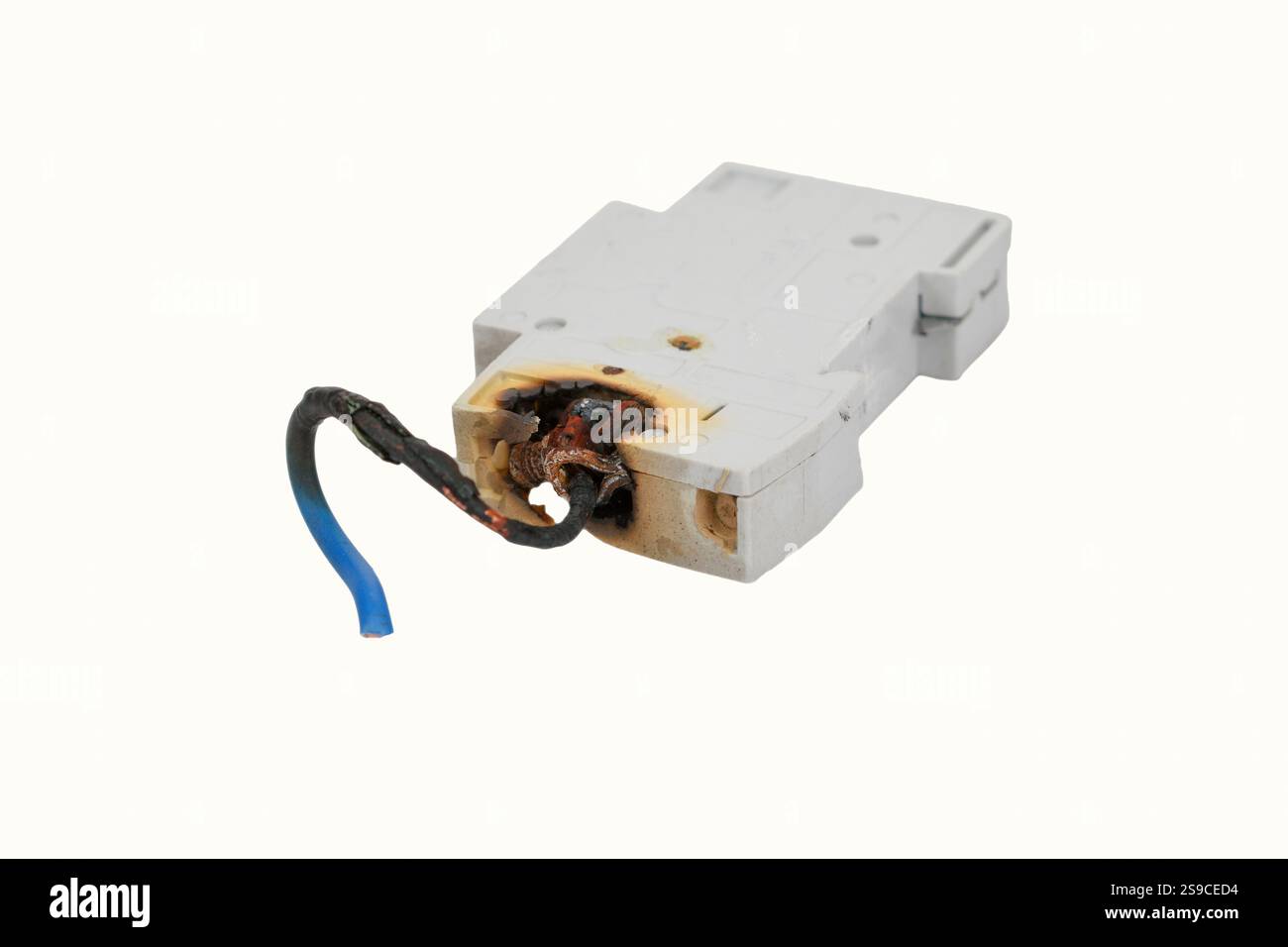 Burned electrical circuit breaker, fuse box on white background. The ...