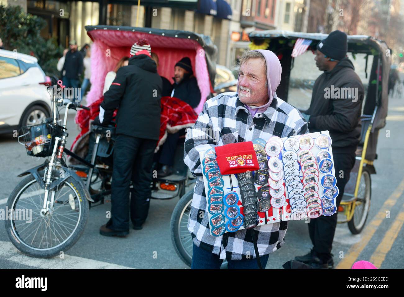 Vendors sell Donald Trump merchandise on Inauguration Day. Trump was ...