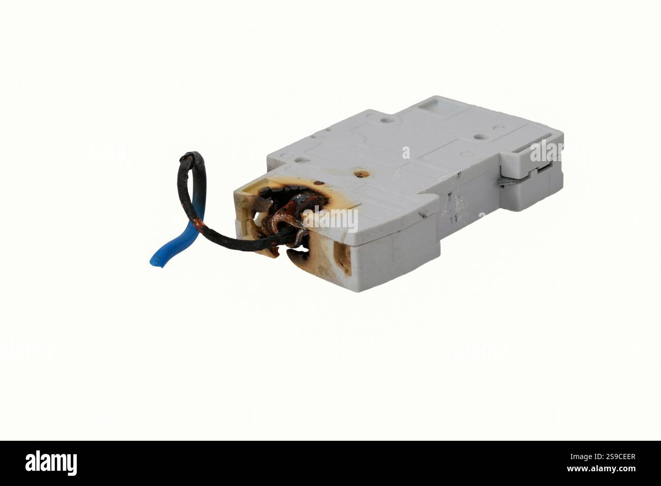Burned electrical circuit breaker, fuse box on white background. The ...