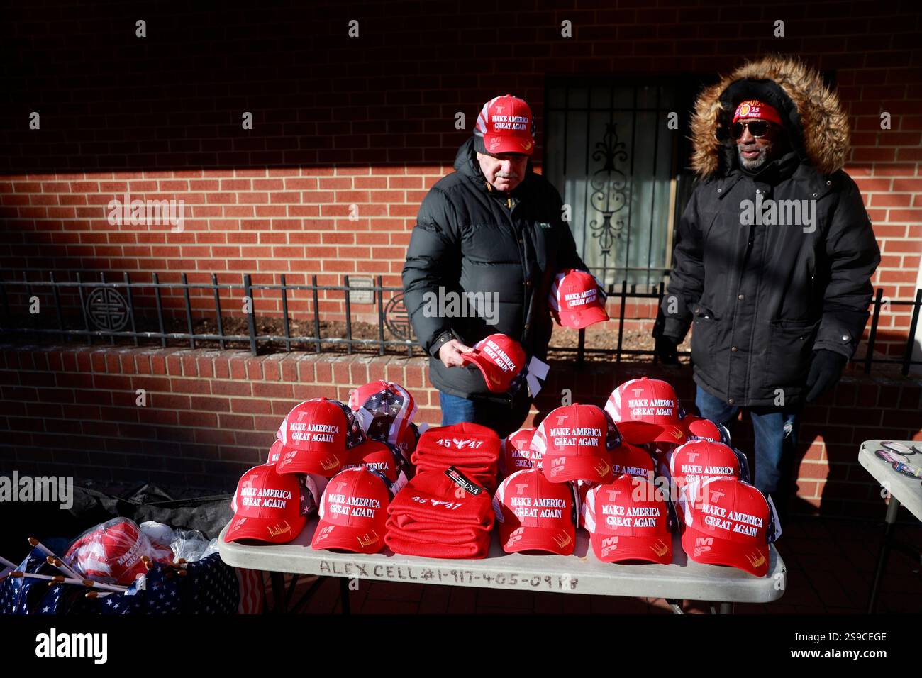 A man sells Donald Trump MAGA hats and other merchandise on ...