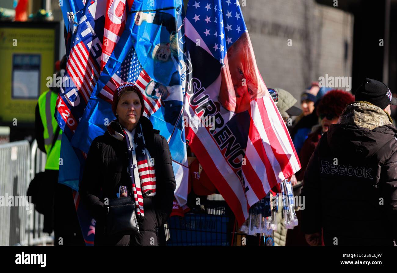 A woman stands near Trump flags outside Capital One Arena after Donald ...