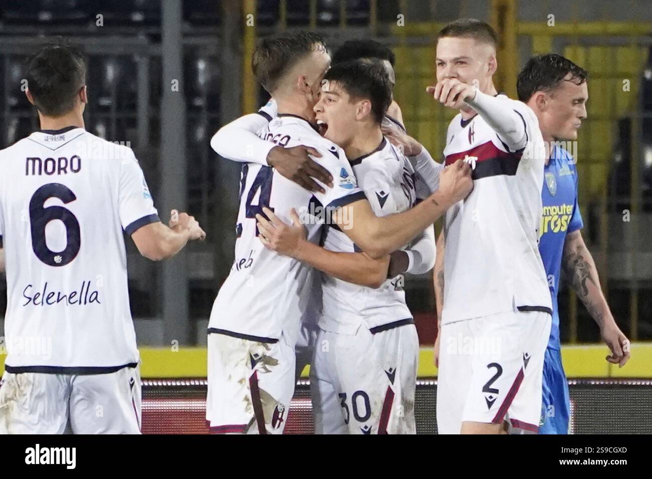 Bologna's Benjamin Dominguez, center, celebrates scoring with teammates ...