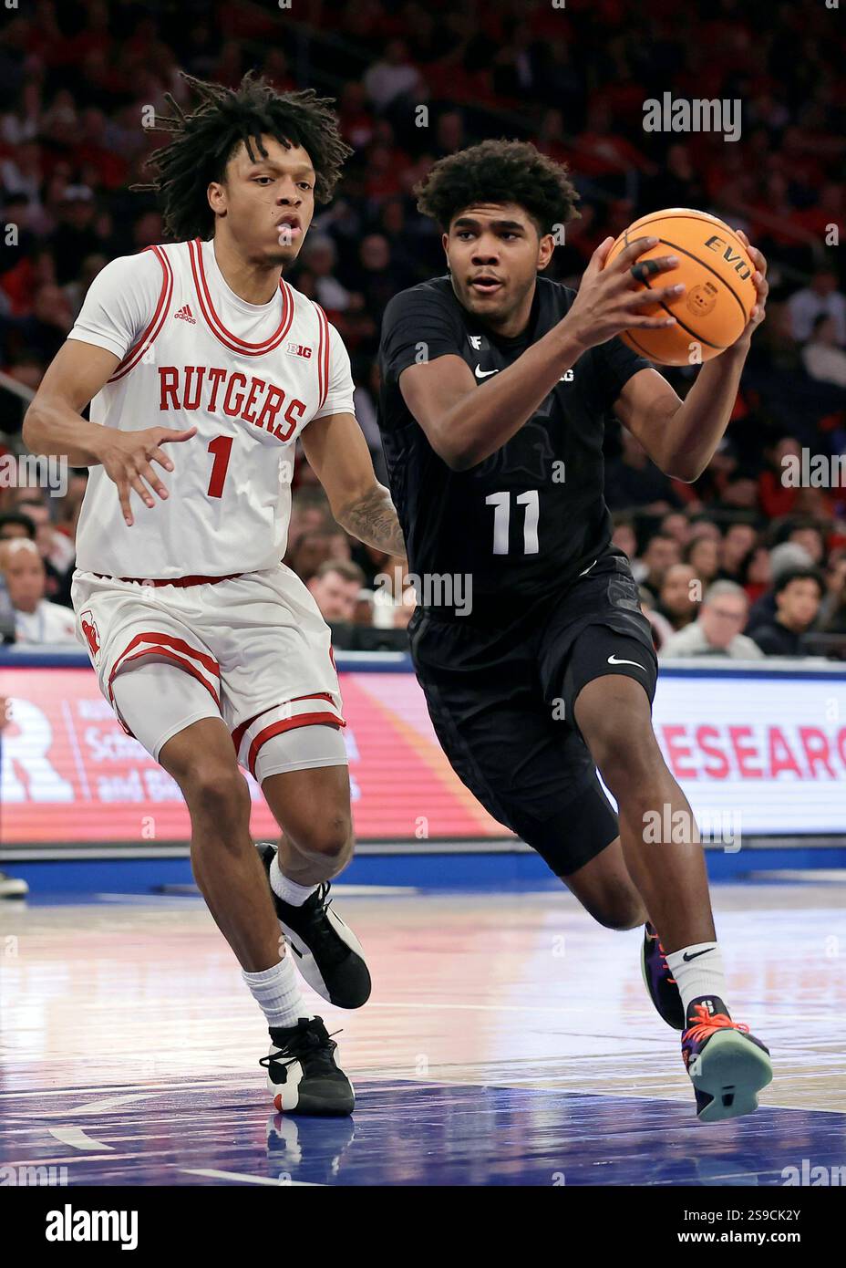 Michigan State guard Jase Richardson (11) drives to the basket past ...