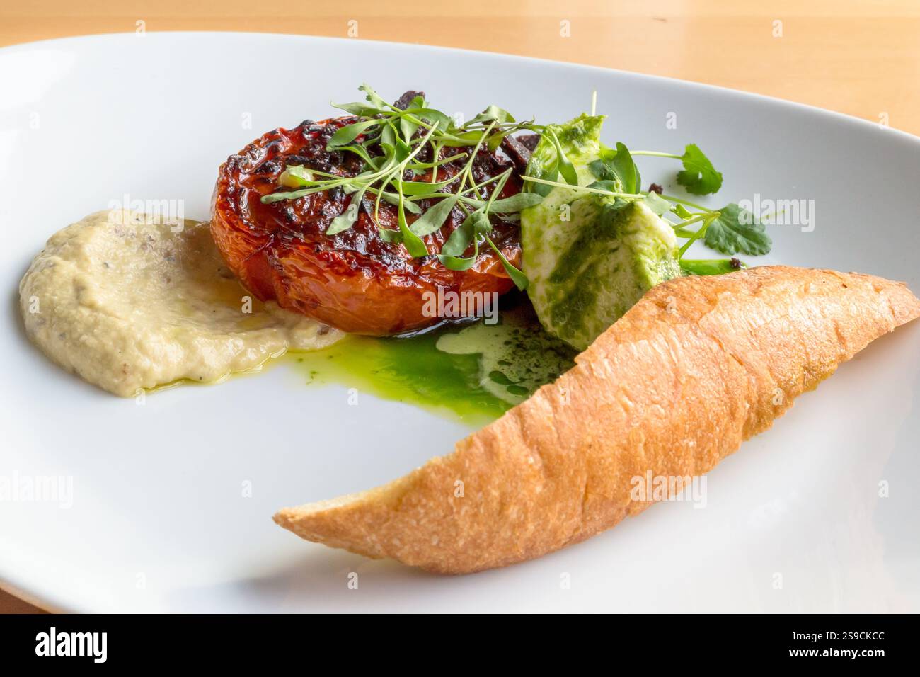 Exquisite Fine Dining Dish Featuring Tomato, Sauce, Bread, and ...