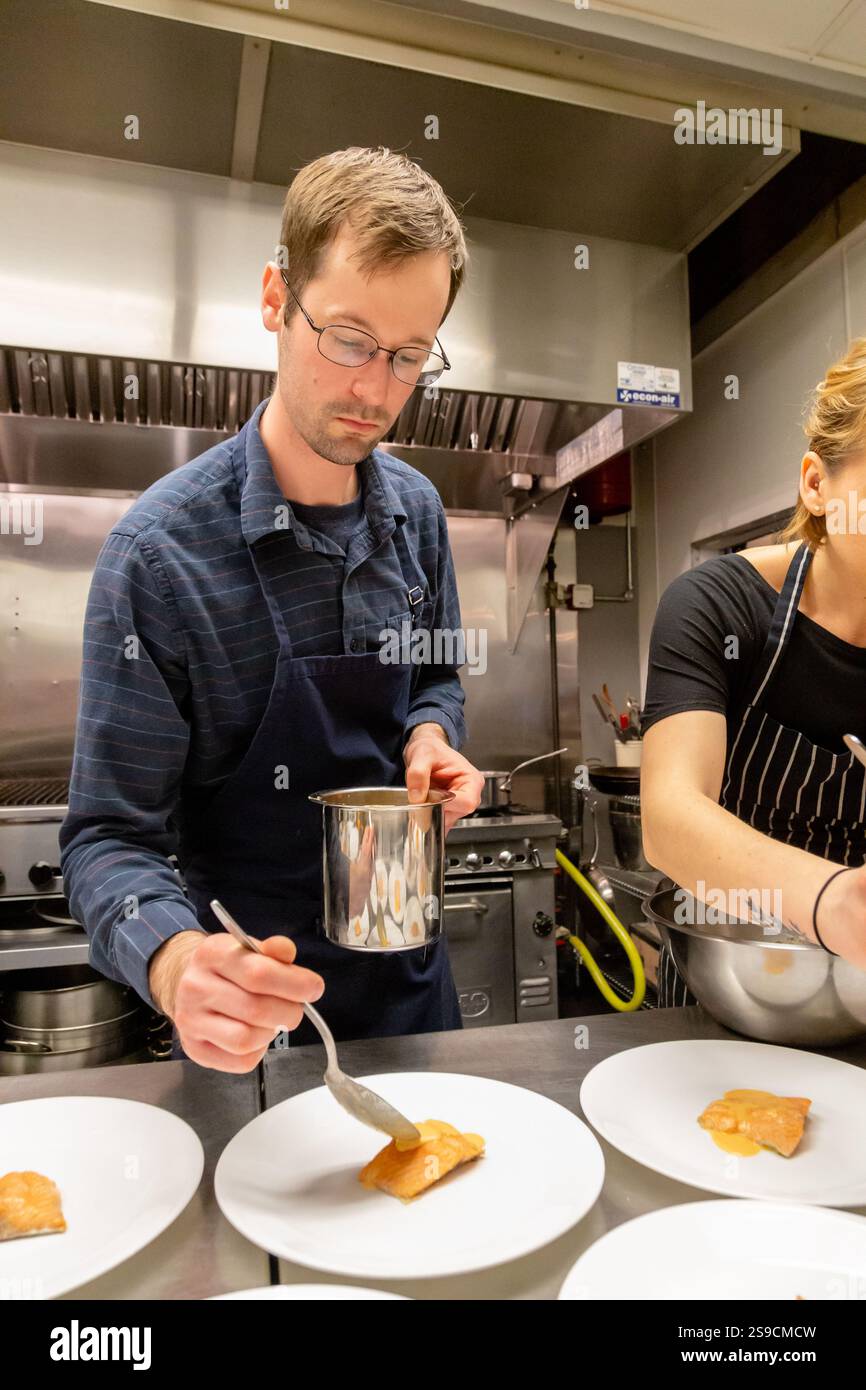 Chef Preparing Gourmet Dishes in a Professional Restaurant Kitchen, Fog ...