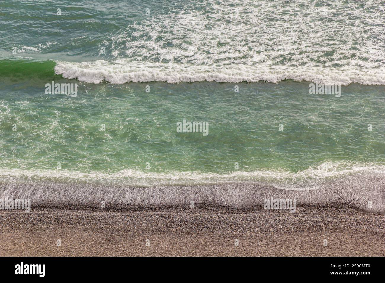 Waves on pebble beach - Miraflores, Lima, Peru Stock Photo - Alamy