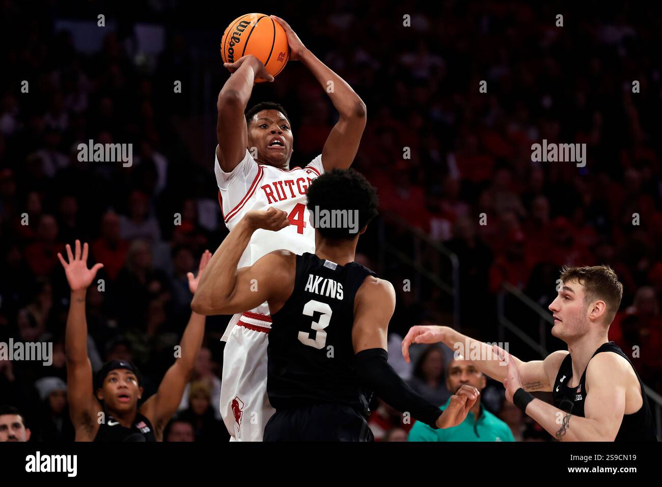 Rutgers guard Ace Bailey (4) shoots over Michigan State guard Jaden ...