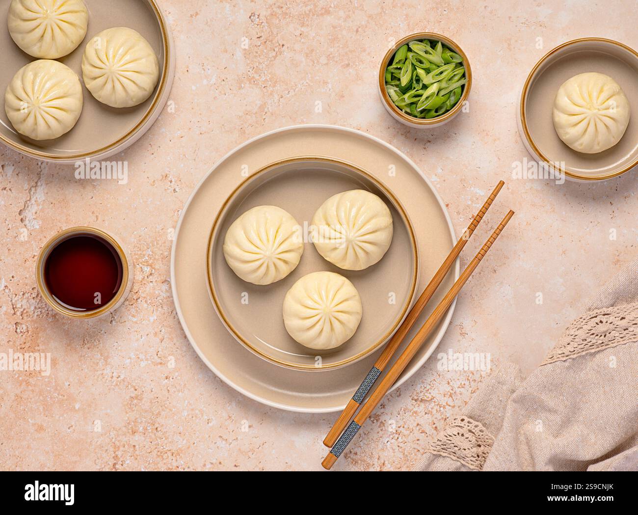 Food photography of steamed duck bao buns, spring onion, soy sauce ...
