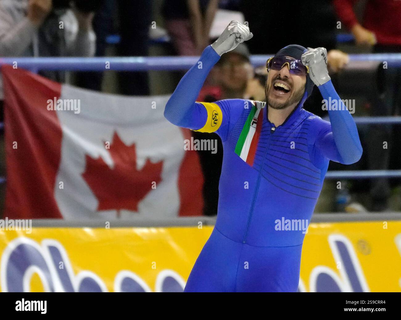 Italian speed skater Davide Ghiotto celebrates after setting the world ...