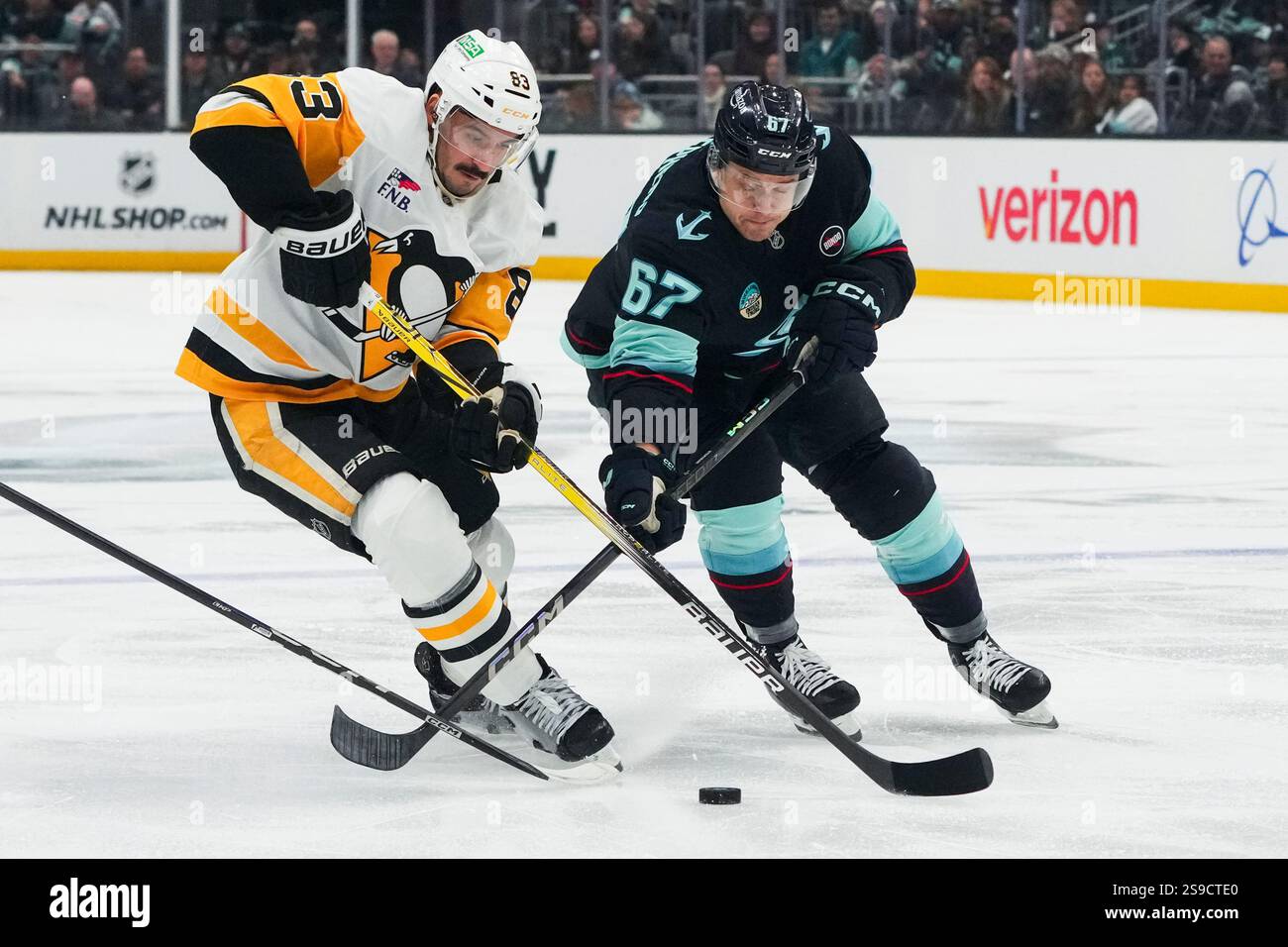 Pittsburgh Penguins left wing Matt Nieto, left, vies for the puck ...